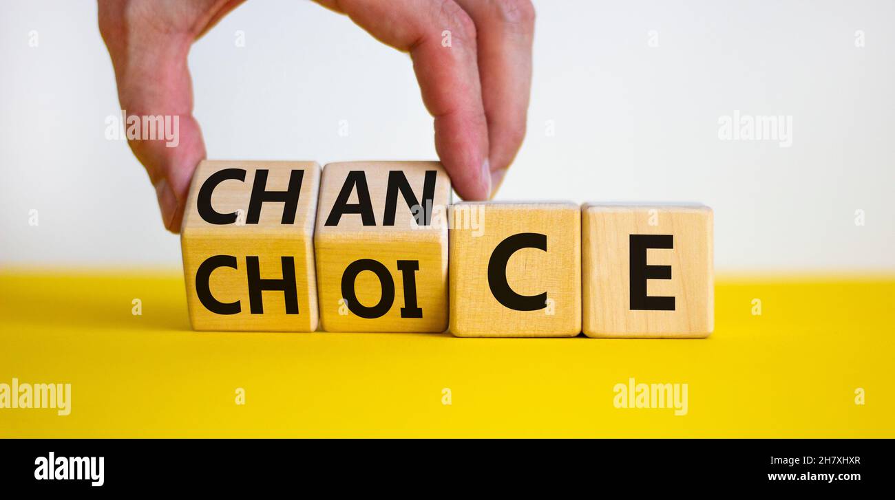 Choice and chance symbol. Businessman turns wooden cubes and changes ...