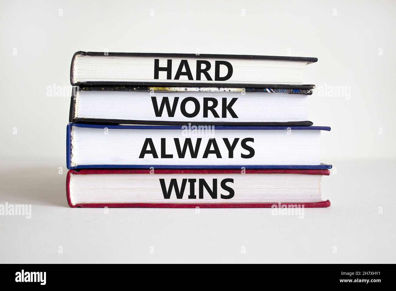 Hard work always wins symbol. Concept words 'Hard work always wins' on ...
