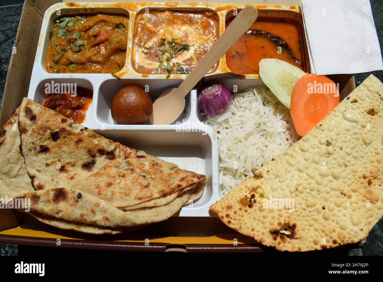 Tasty Indian lunch pack parcel of packed food consisting of variety of ...