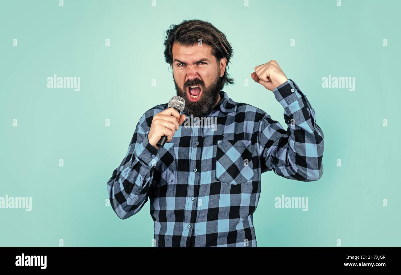 hipster with long hair and moustache sing song. male in karaoke. music ...