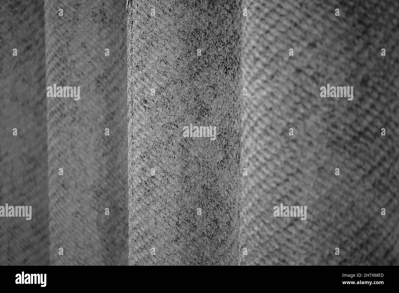 Closeup old slate sheet fence. Black and white photo Stock Photo - Alamy