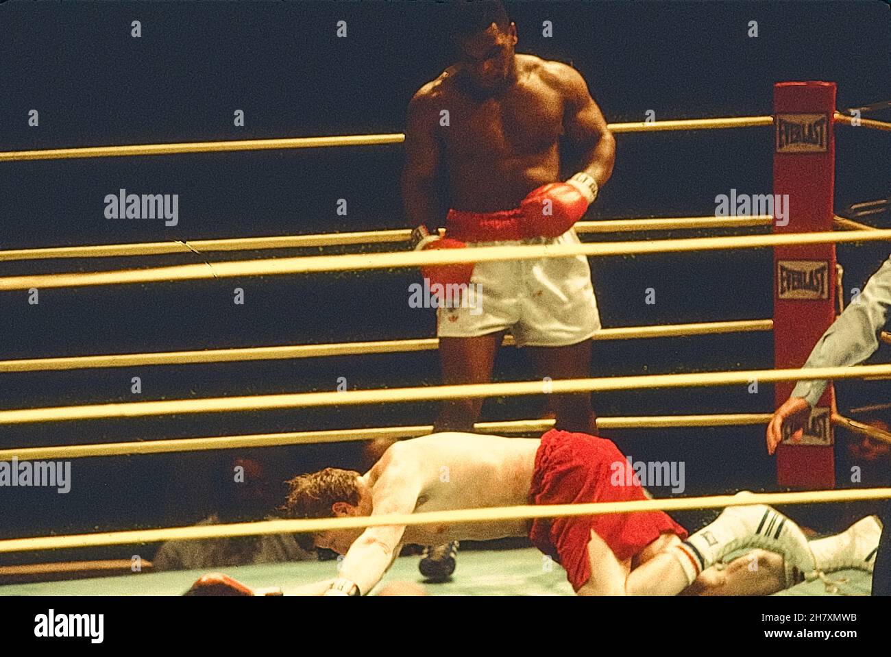 Mike Tyson knocks down Steve Zouski during fight at the Nassau Coliseum ...