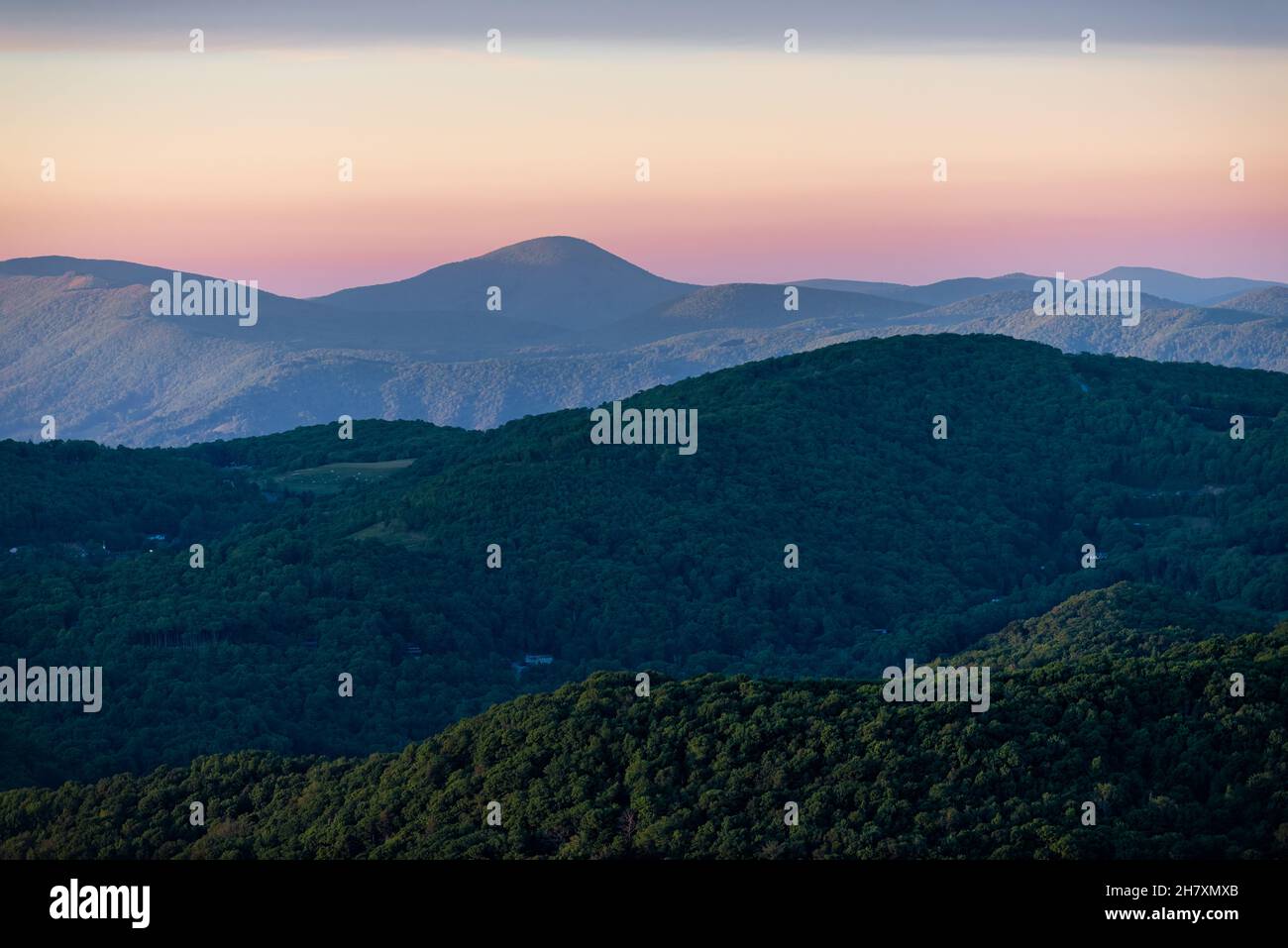 View from Sugar Mountain of sunset dusk ridge layers and peaks in North ...