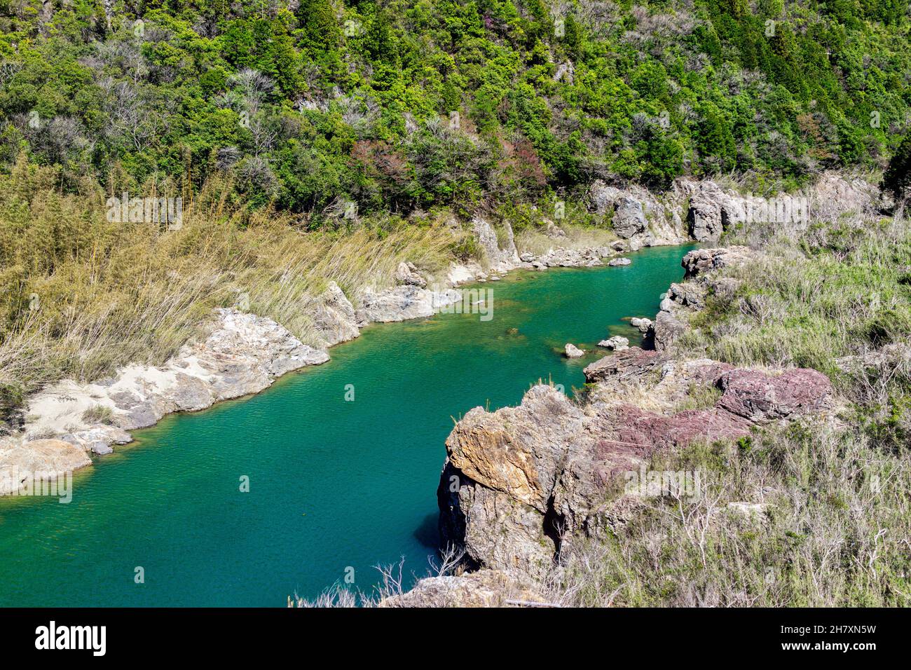 Emerald blue and green turquoise colorful Hida river high angle aerial ...