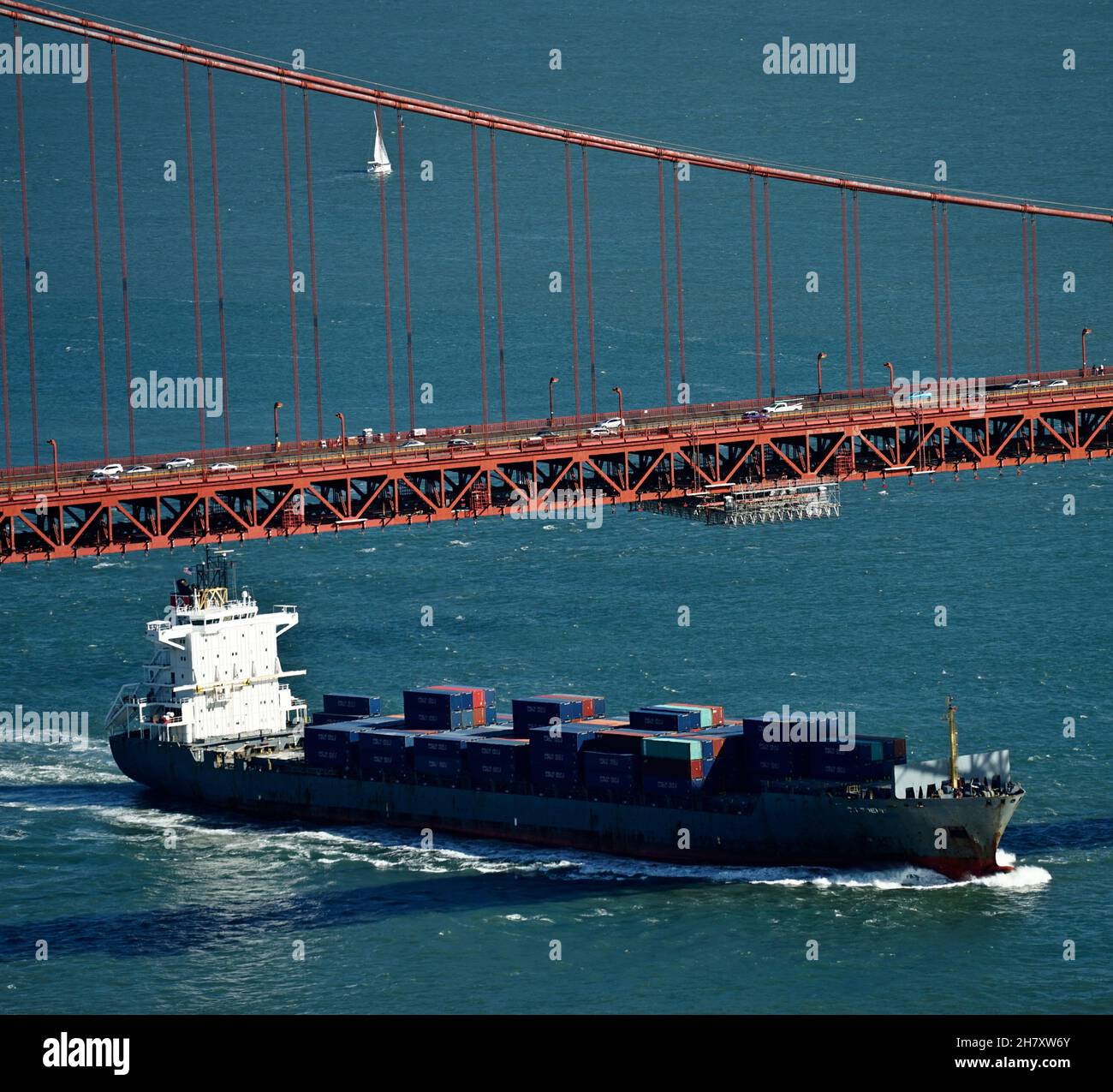 Cargo Ship under the Golden Gate Bridge Stock Photo - Alamy