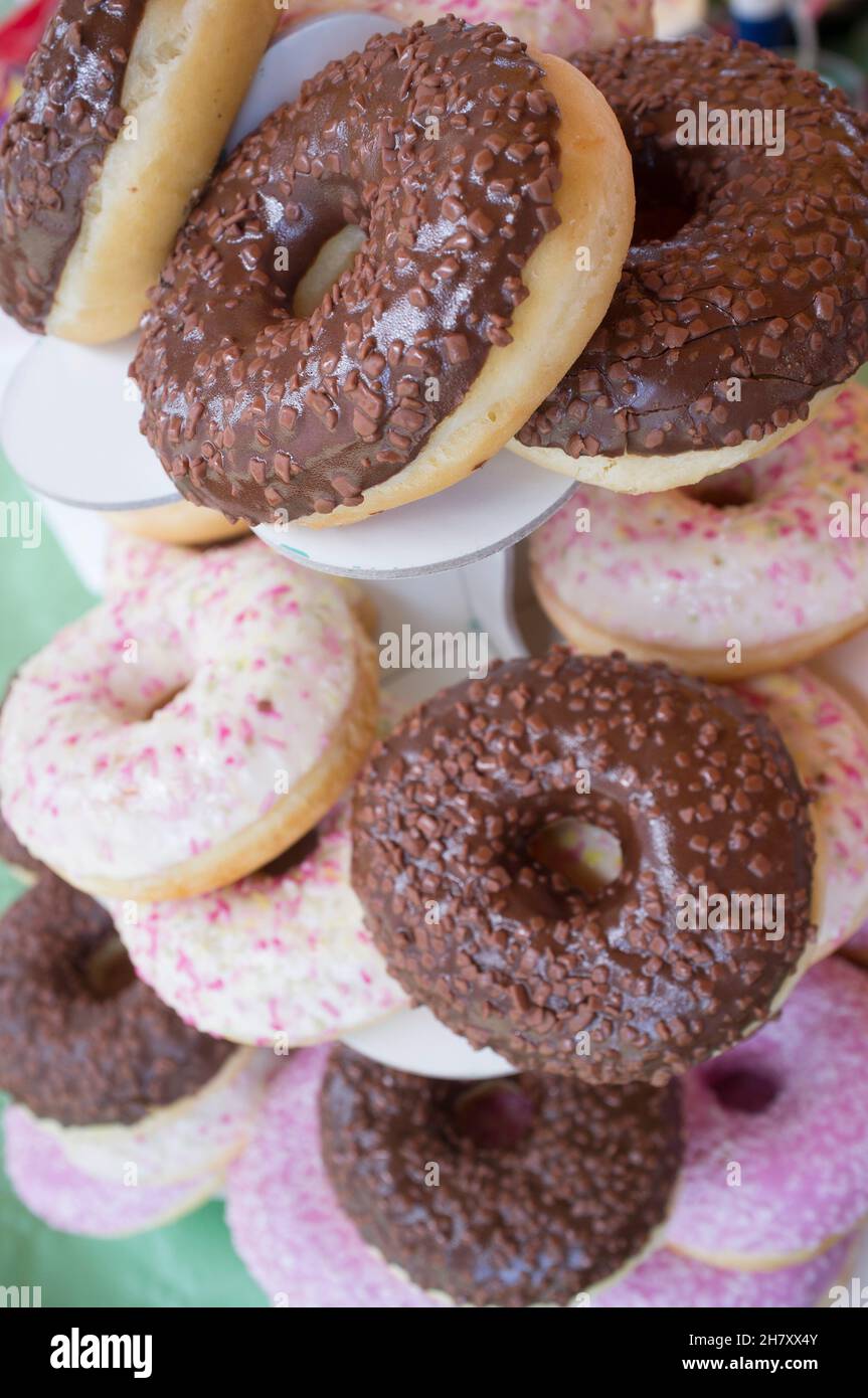 Pile of delicious almond sprinkled donuts. Overhead view Stock Photo ...
