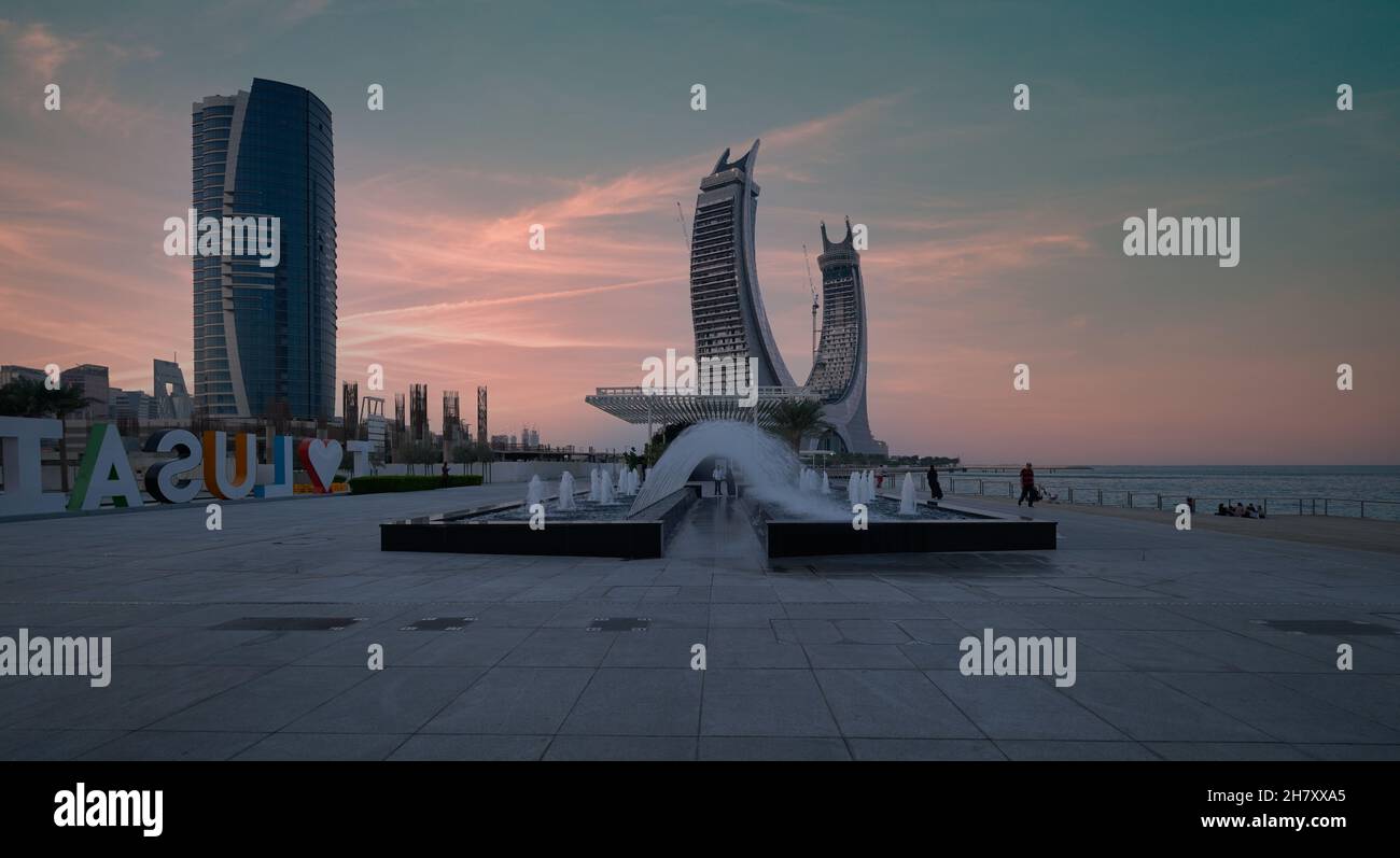 Lusail Corniche at the marina sunset shot showing fountain, people ...