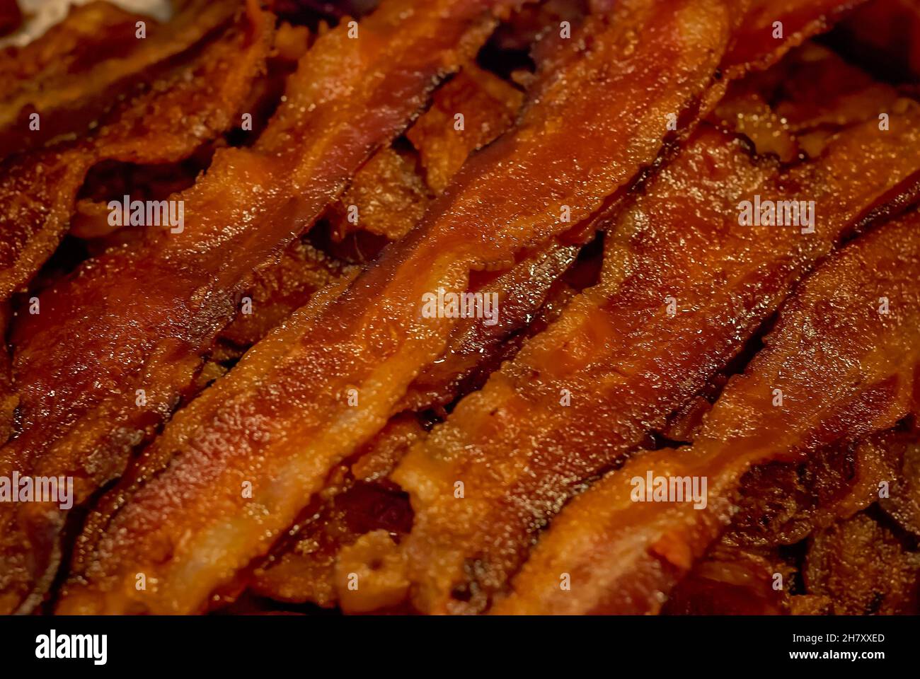 Strips of fried bacon lay in a pan, July 9, 2011, in Columbus ...