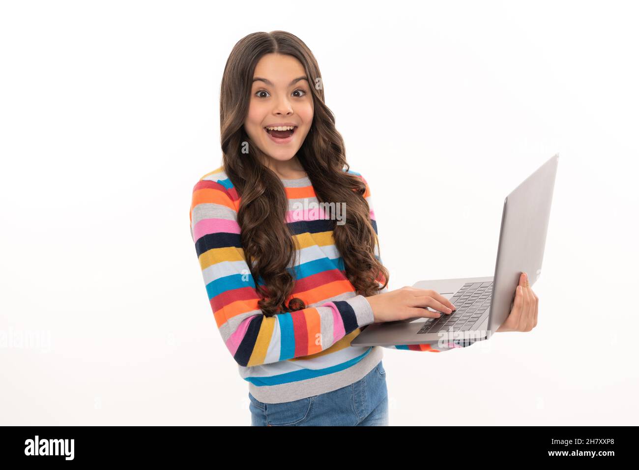 surprised kid study online education typing school blog or check email ...