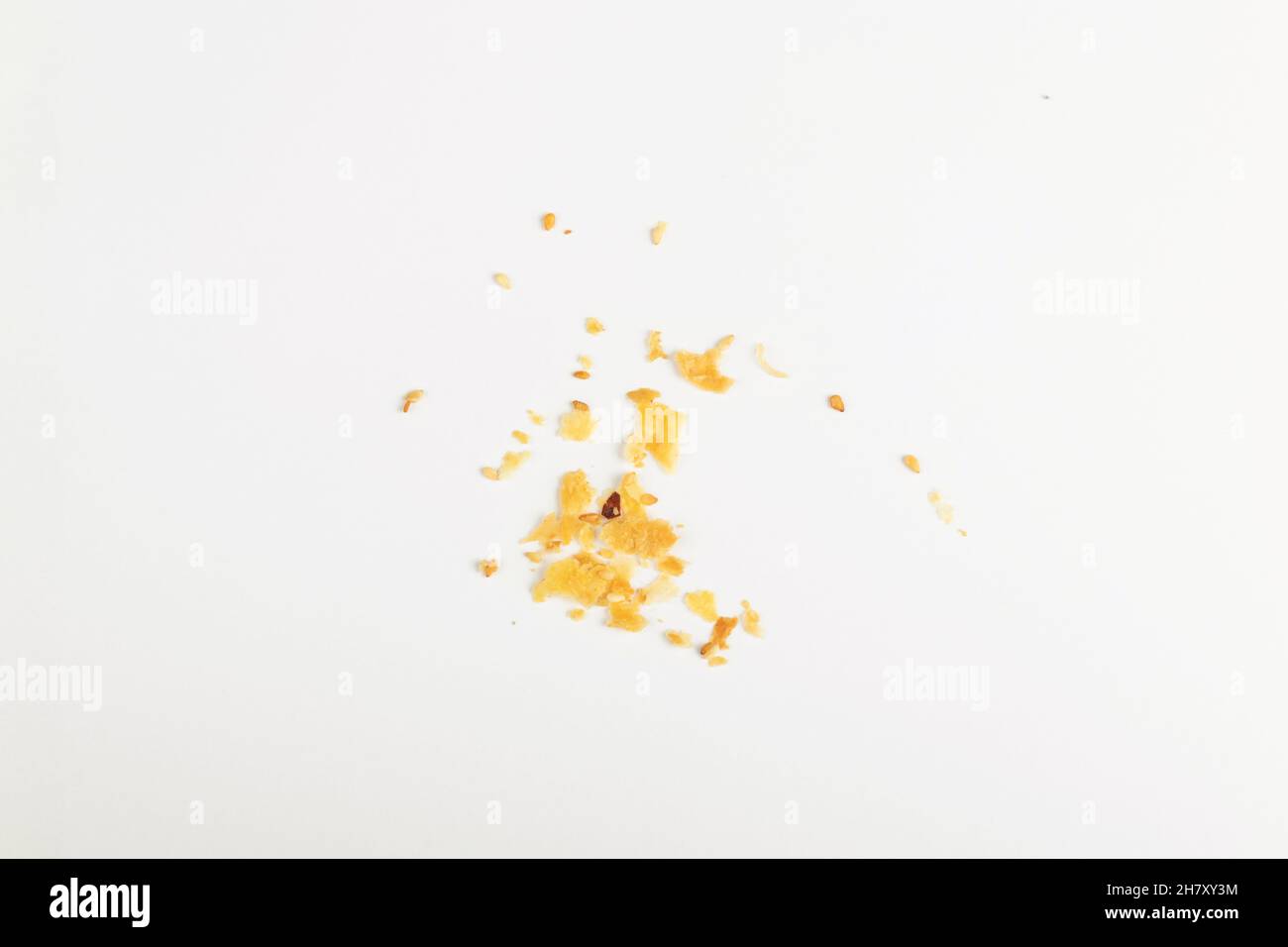 Scattered crumbs isolated on white background Stock Photo - Alamy