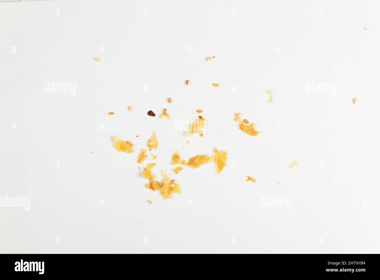 Scattered crumbs isolated on white background Stock Photo - Alamy