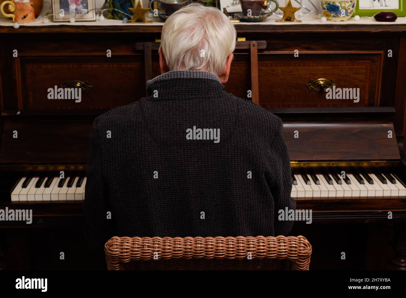 Person Playing Piano Back View