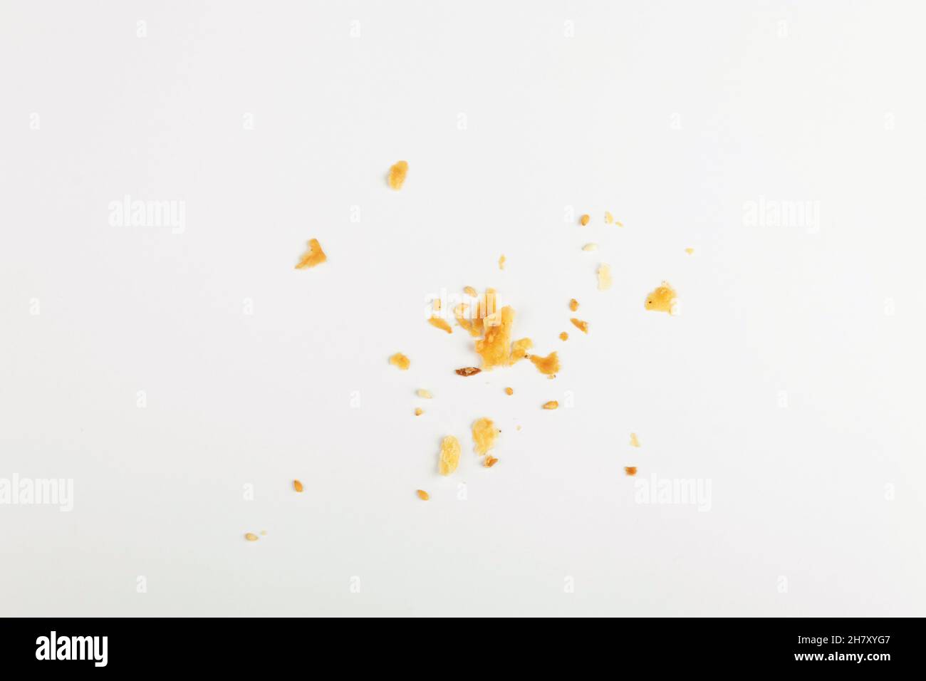 Scattered crumbs isolated on white background Stock Photo - Alamy