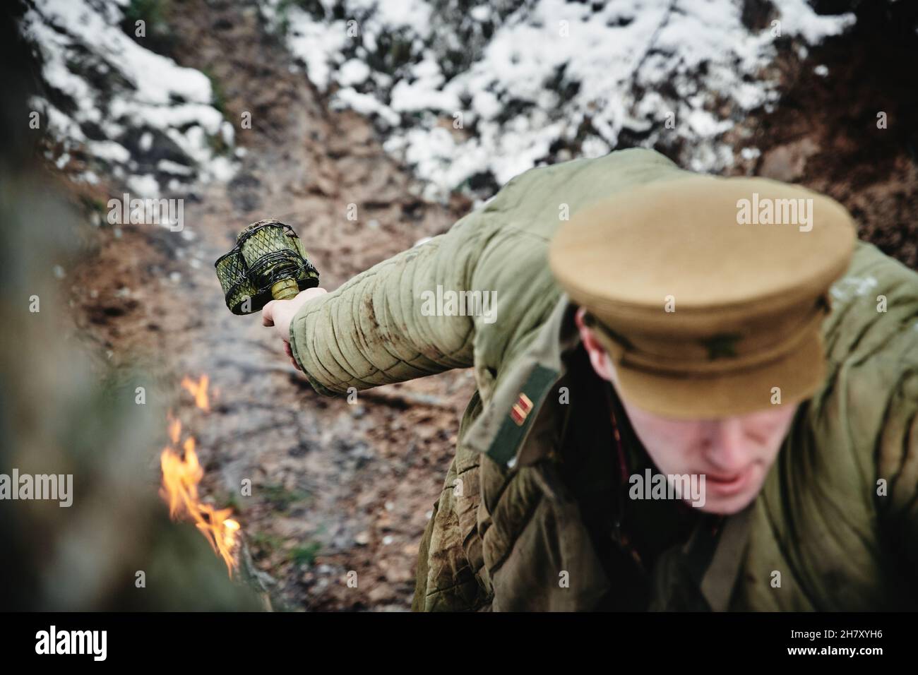 Soviet soldier of World War II prepares to throw a grenade from a ...