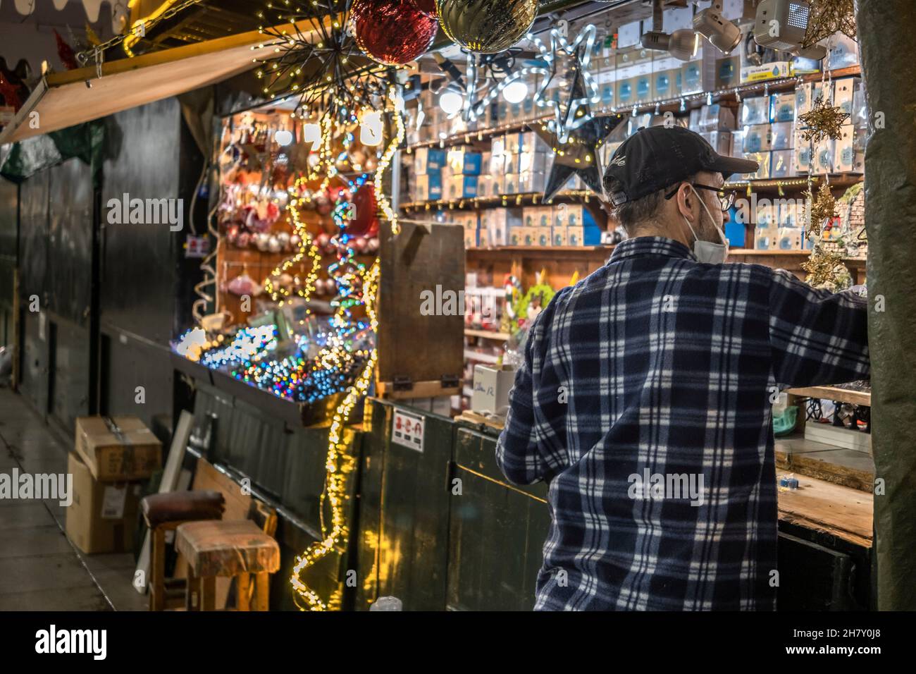 Barcelona, Spain. 25th Nov, 2021. A Christmas craft vendor is seen ...