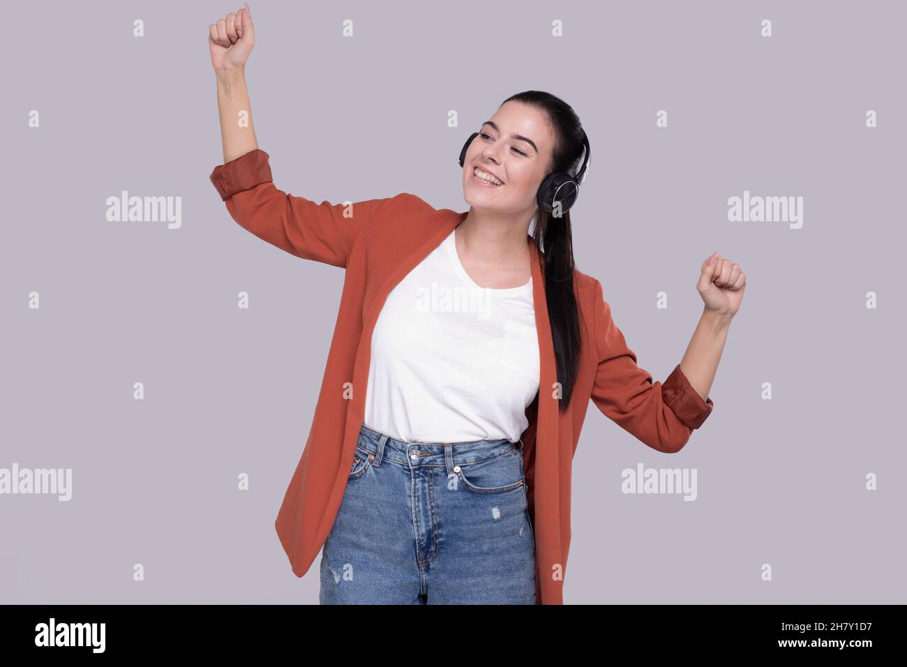 Girl Listening to Music Enjoying It. Girl Listening Music with wireless ...