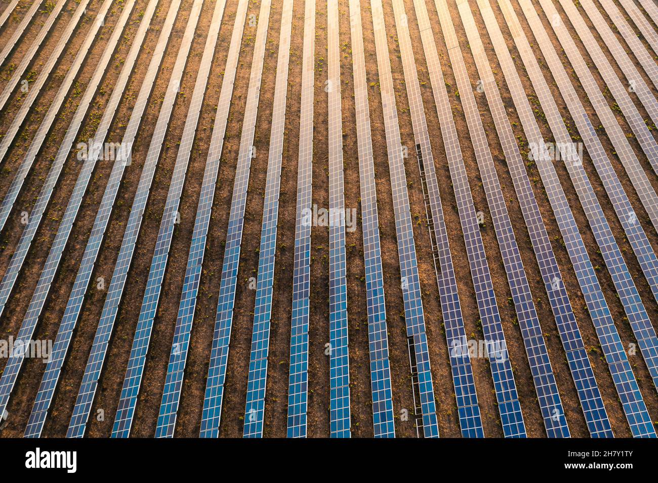 Aerial view of solar power plant. Drone flying above ground-mounted ...
