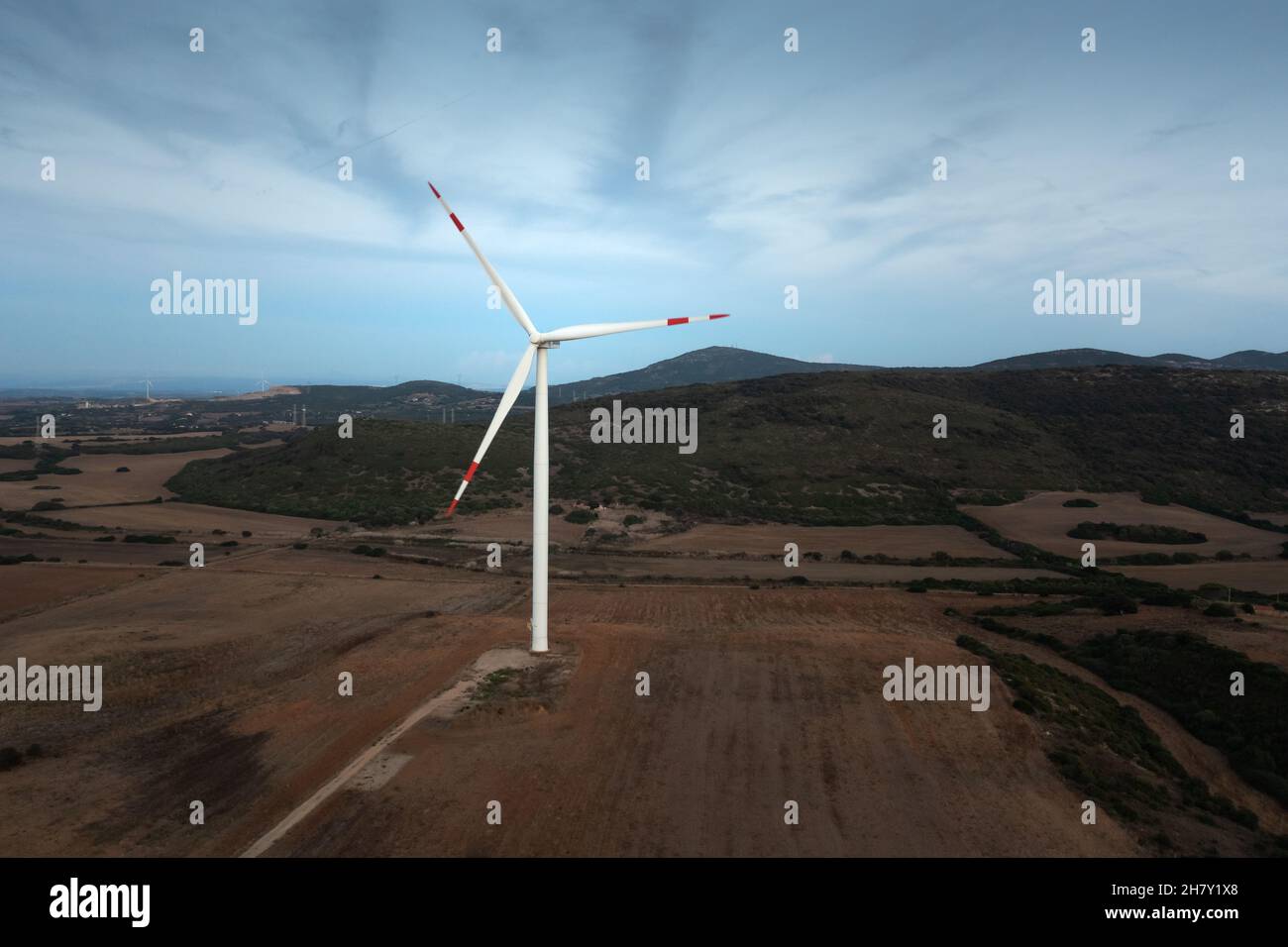 Drone view of wind turbine installed in mountainous region inland ...