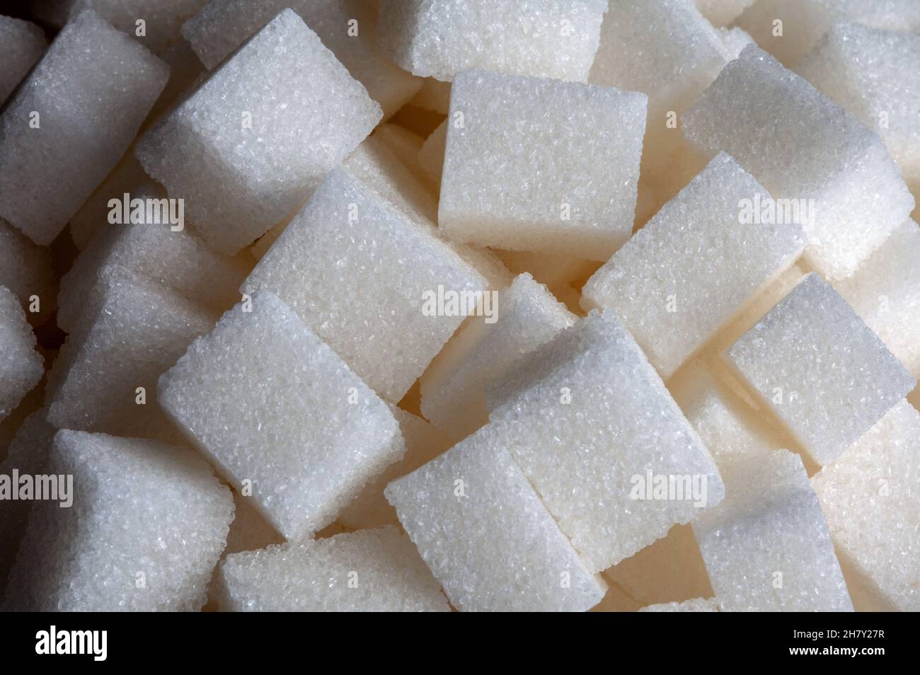 White Sugar cubes background image top view Stock Photo - Alamy