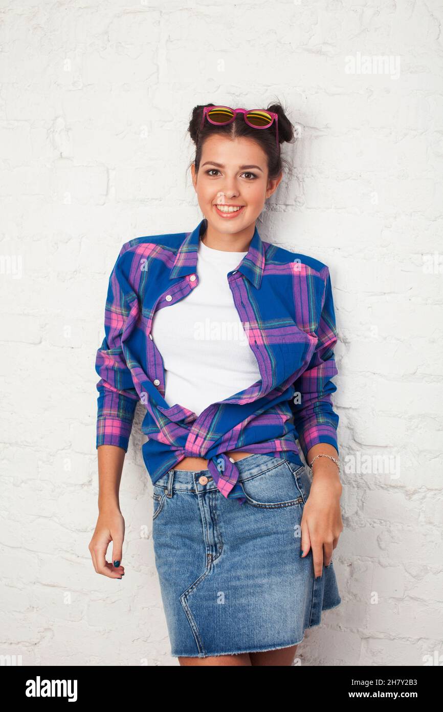 young pretty stylish hipster girl posing emotional isolated on white ...