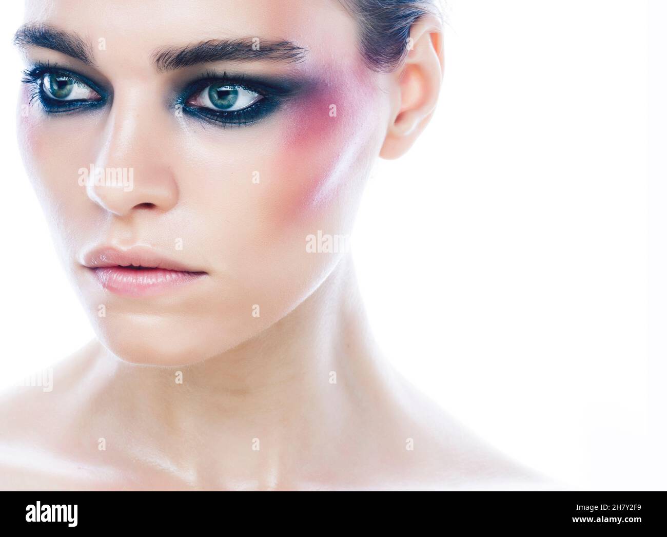 young beauty woman with makeup like shiner on face close up isolated ...