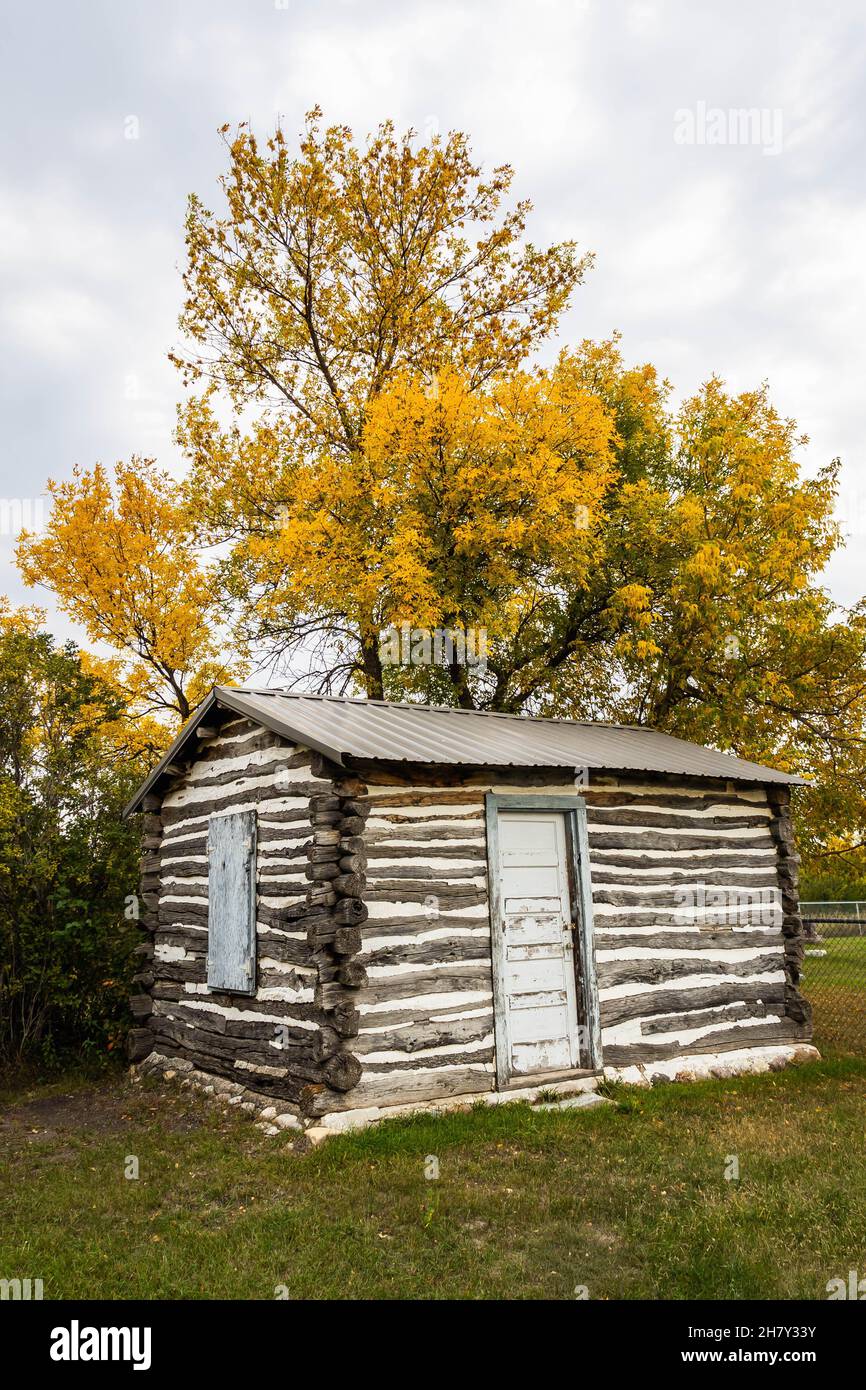 An old pioneer log cabin with fall colors in North Dakota Stock Photo ...