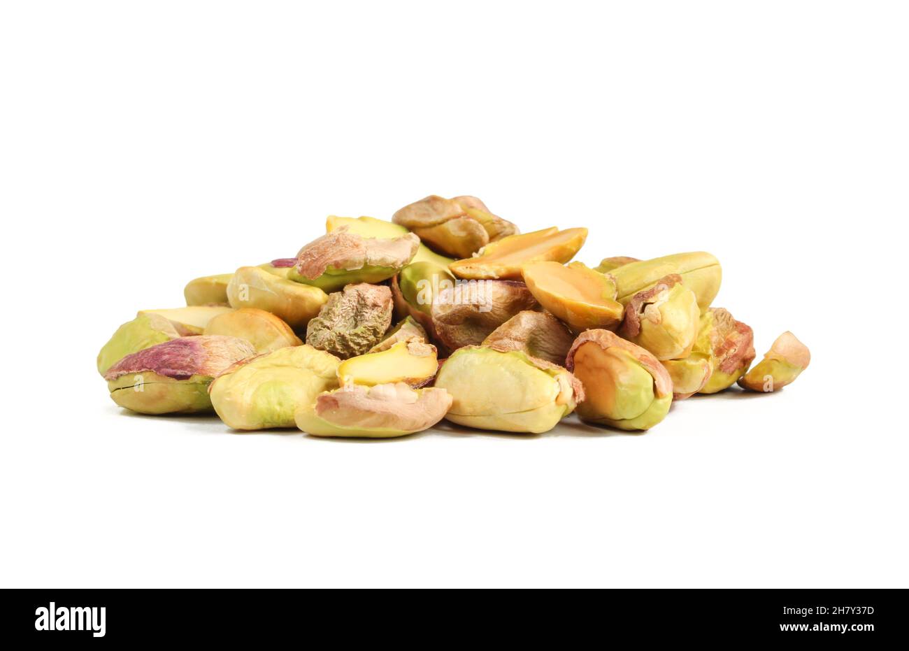 Peeled pistachio seeds isolated on white background.Group of salty ...