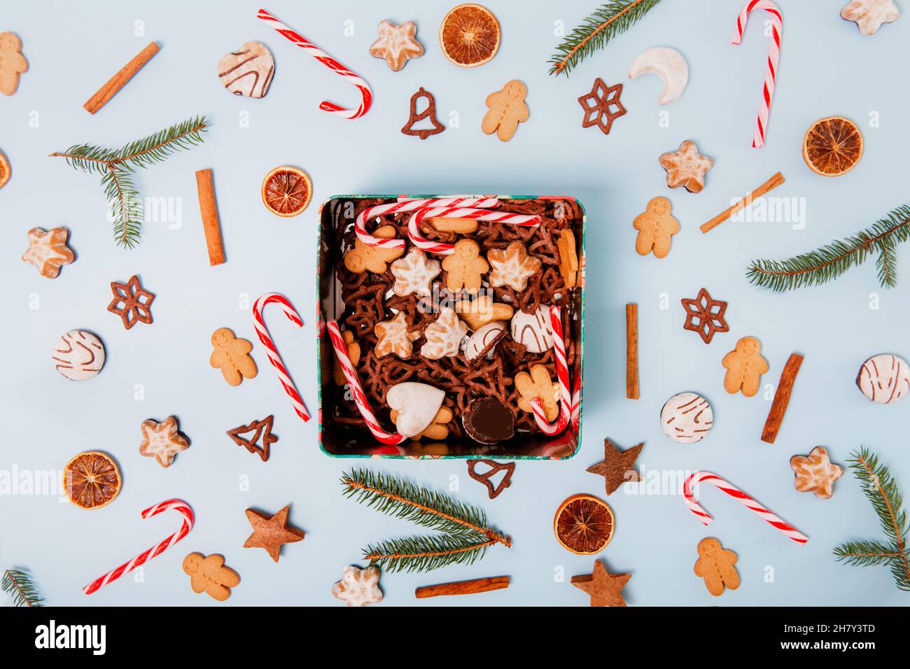 Top view background of Christmas sweets in the metal box and on the ...