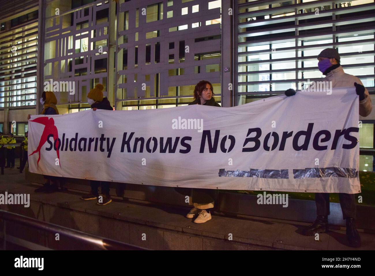London, UK. 25th Nov, 2021. Protesters hold a 'Solidarity Knows No ...