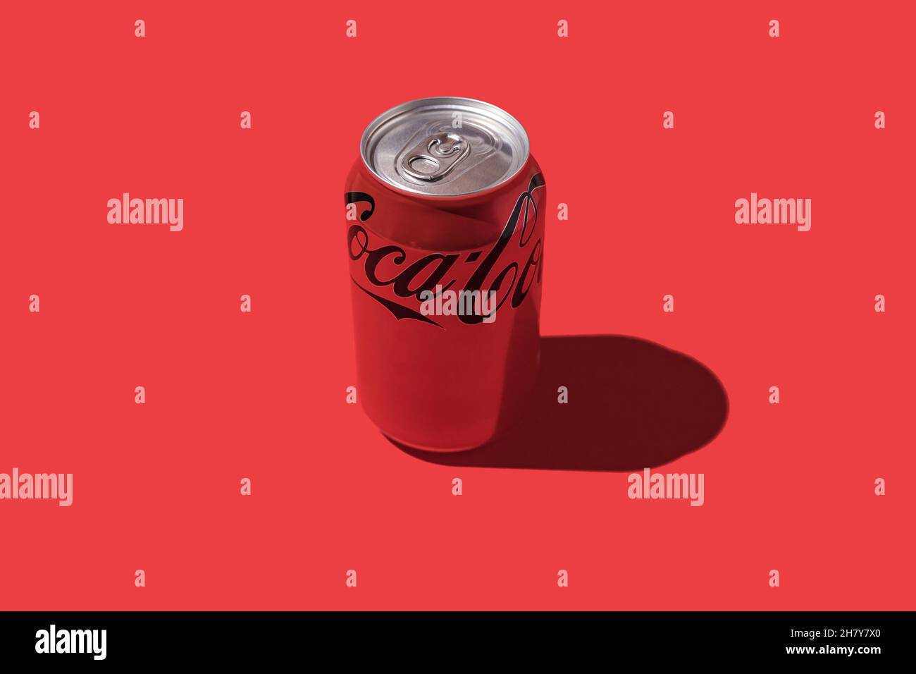 Madrid, Spain - November 26, 2021: Coca cola can with hard shadow on ...