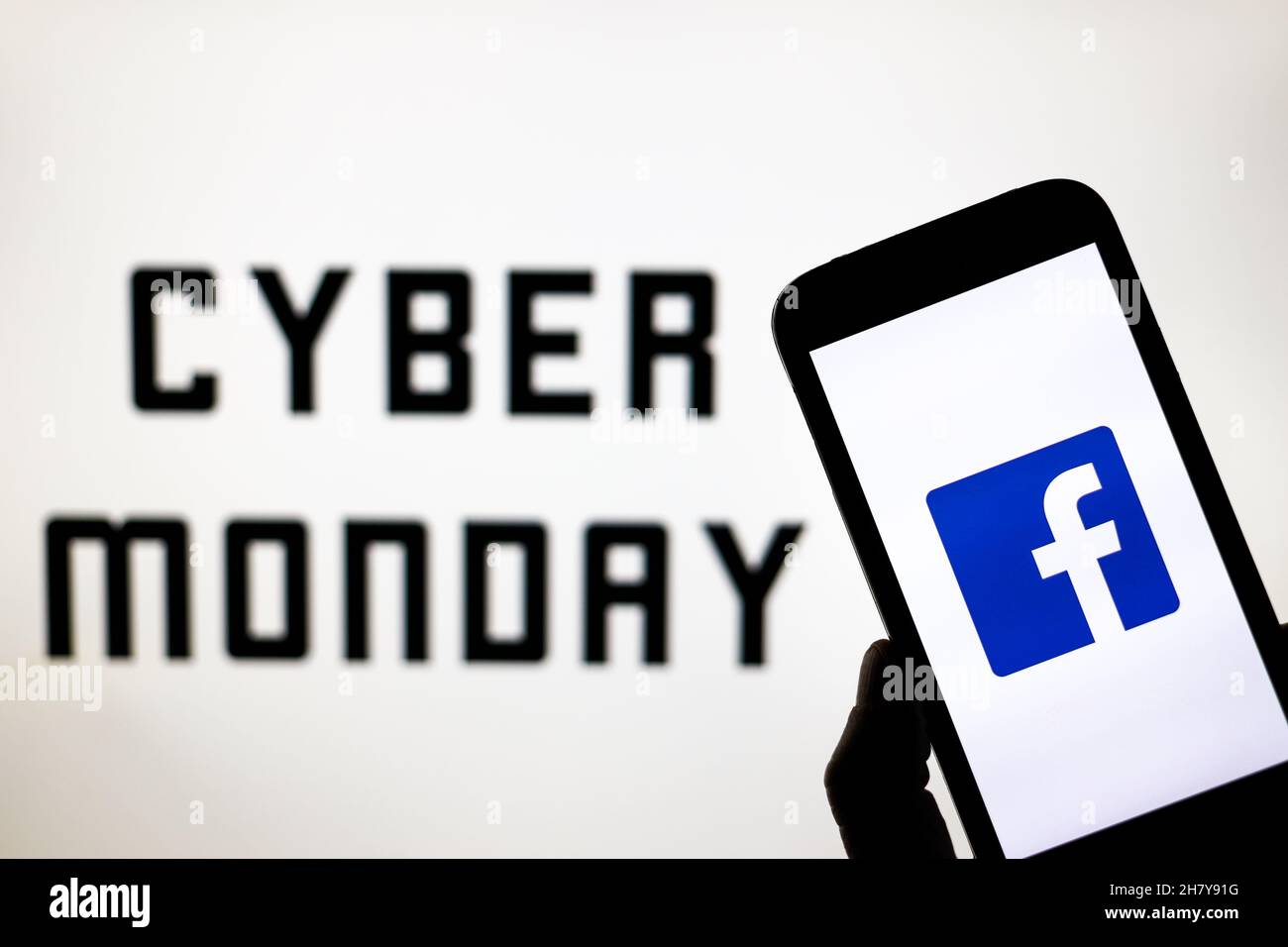 Facebook logo seen displayed on a smartphone Stock Photo - Alamy