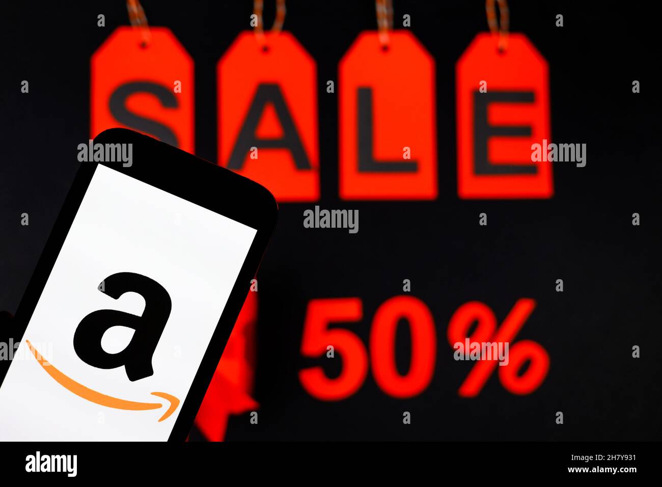 Amazon logo seen displayed on a smartphone Stock Photo - Alamy