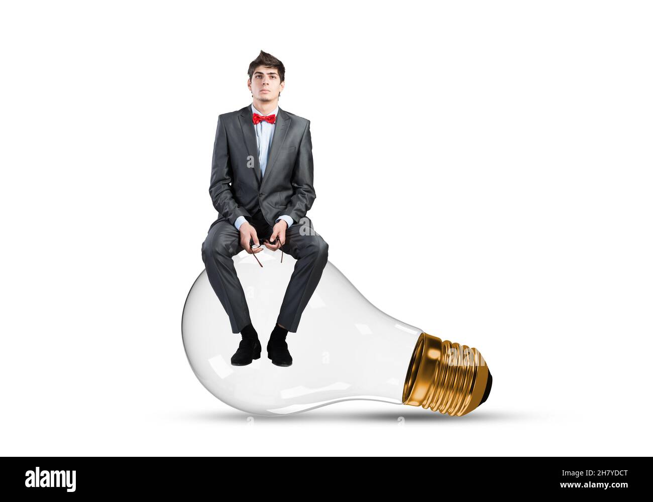 Person thinking lightbulb Cut Out Stock Images & Pictures - Alamy