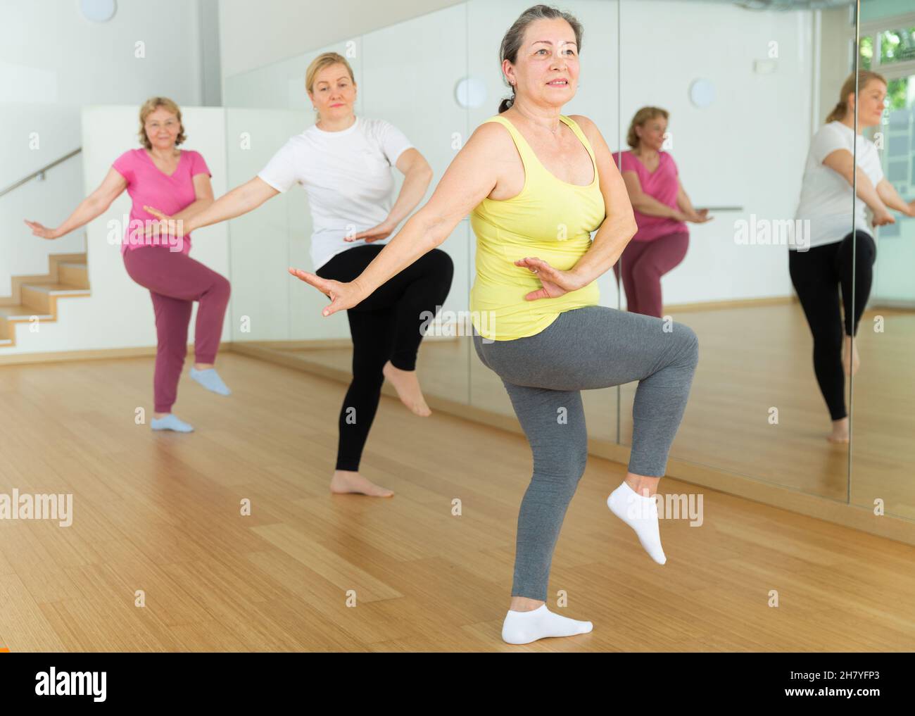 Mature women dancing aerobics at lesson in dance class Stock Photo - Alamy