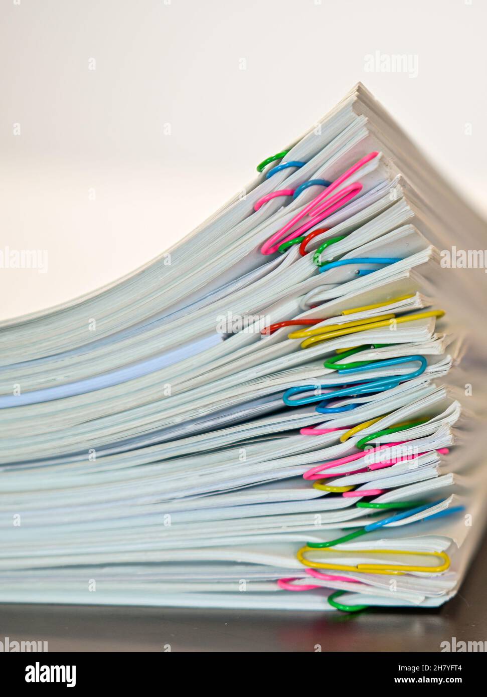 piles of documents piled up on the desk Stock Photo - Alamy