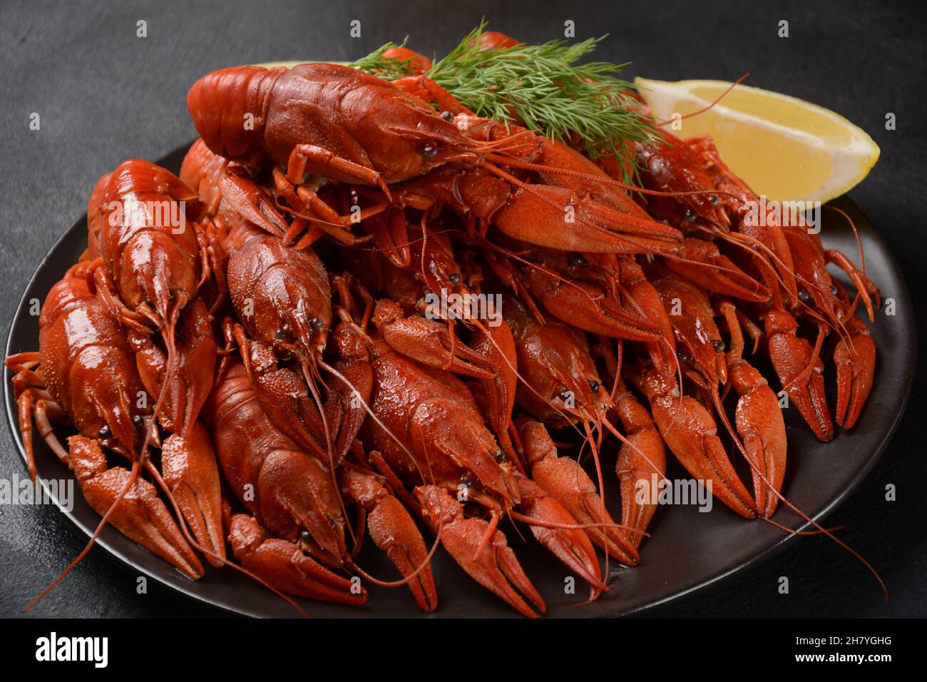 Red boiled crawfishes on table in rustic style. Asian Chinese Food ...