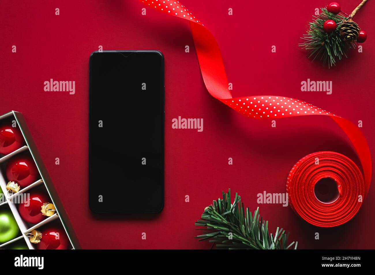 Christmas phone app and holiday message concept. Smartphone with blank ...