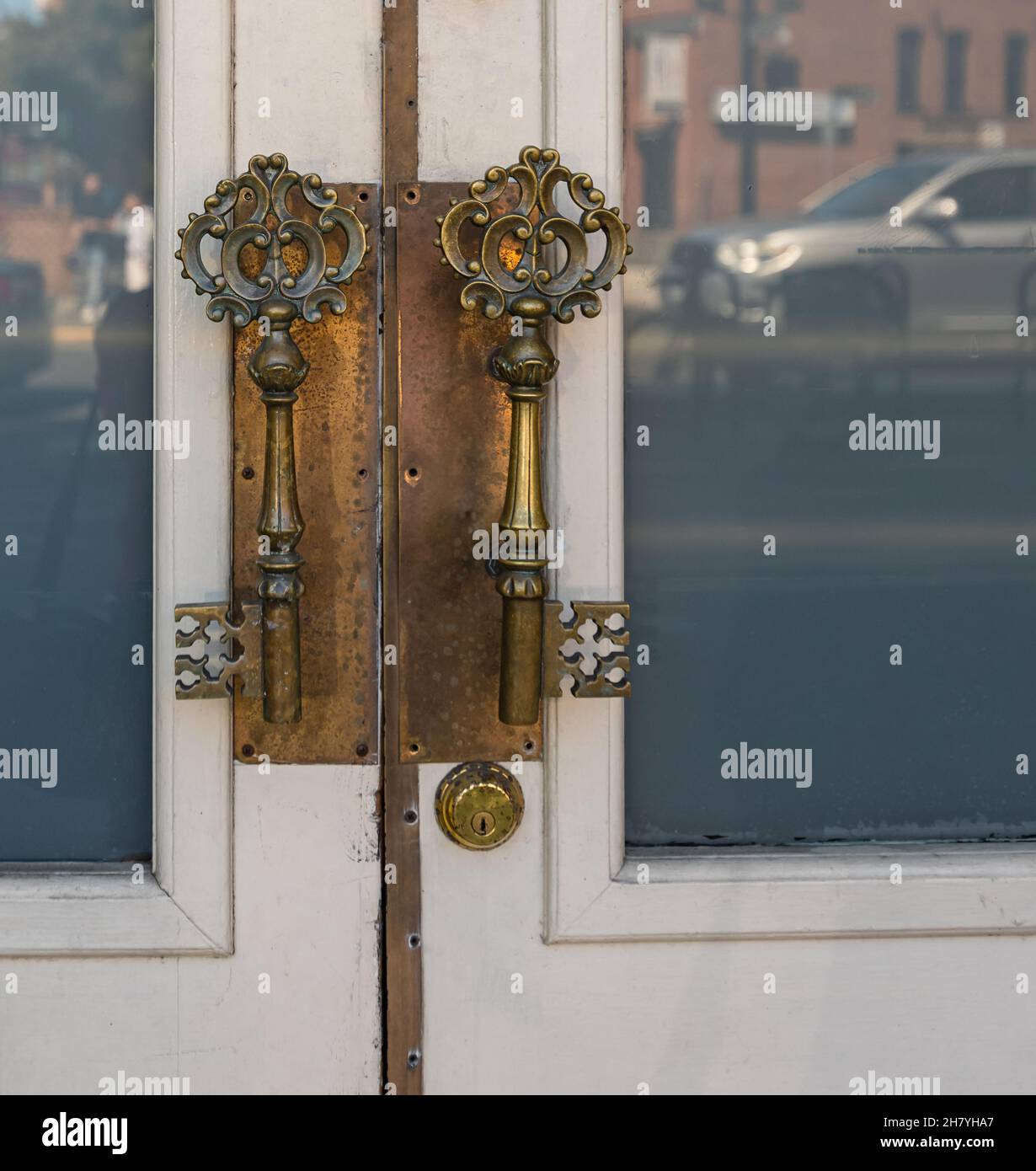 Old metal door handles in form of antique key in downtown of Victoria ...