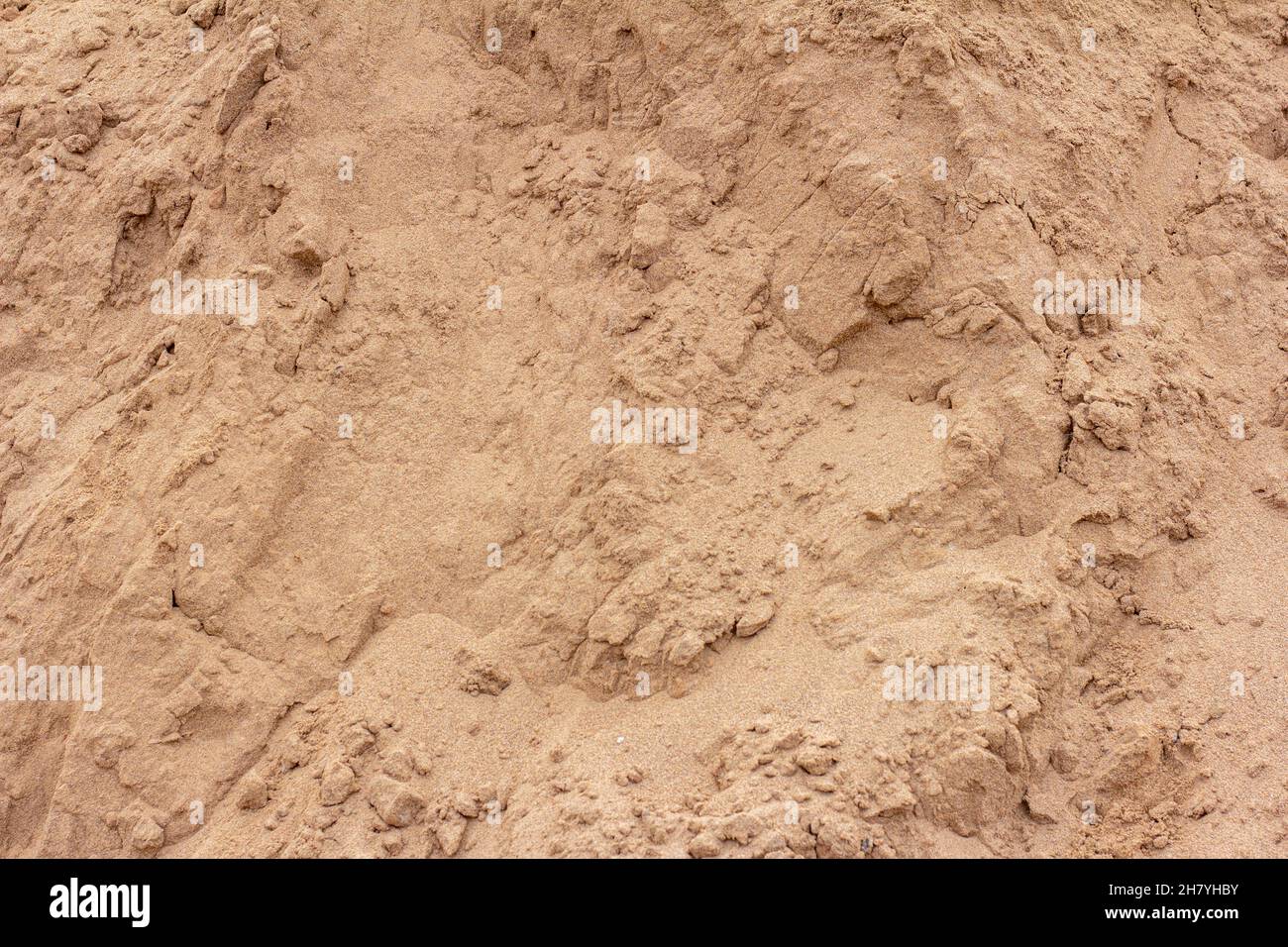 Sandy background, texture of dry sand with lumps Stock Photo - Alamy