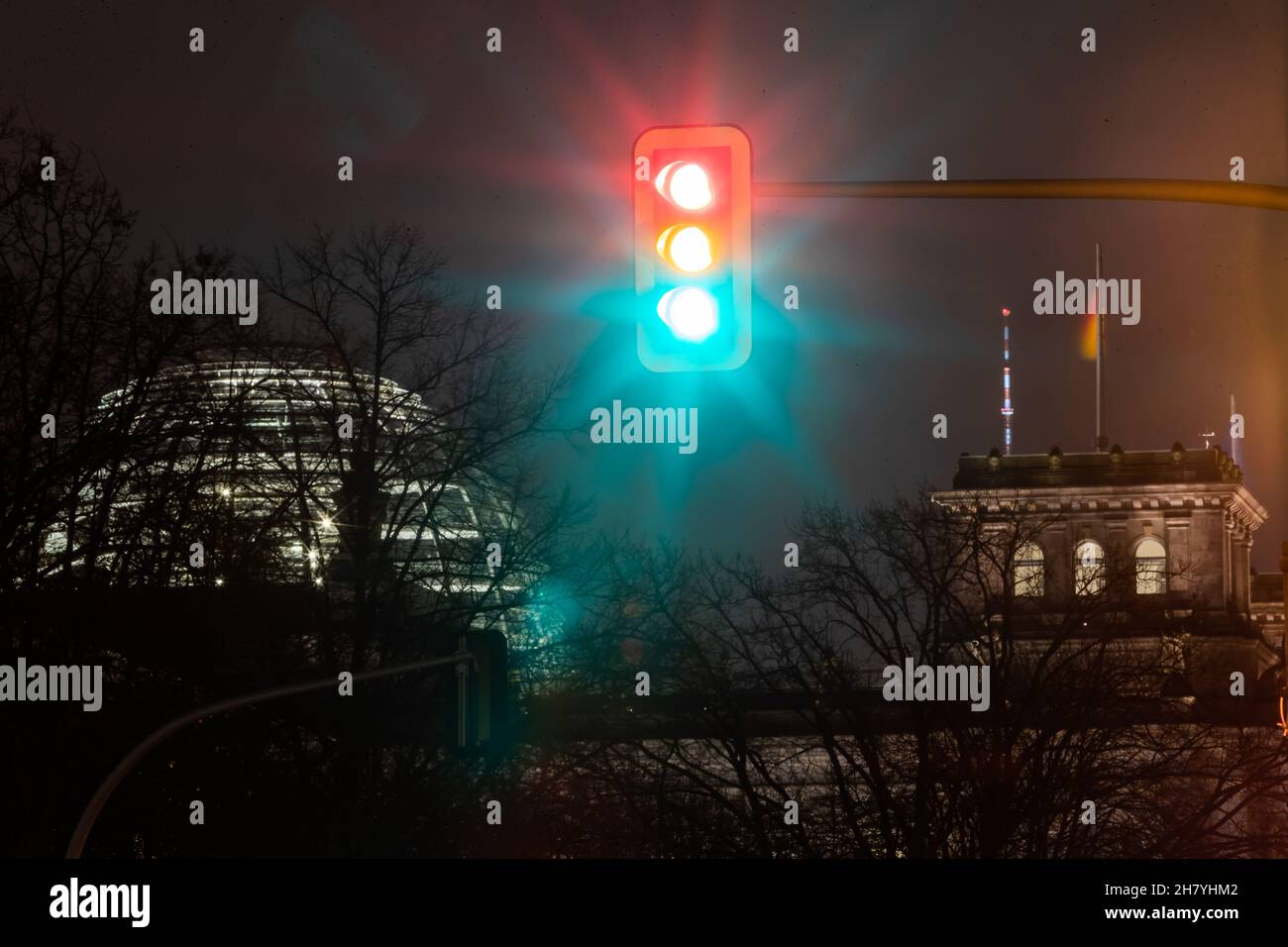 Berlin, Germany. 26th Nov, 2021. A traffic light shines in all three ...