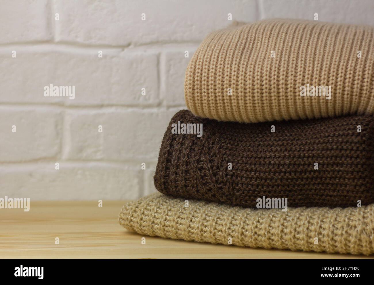 Folded jumpers hi-res stock photography and images - Alamy