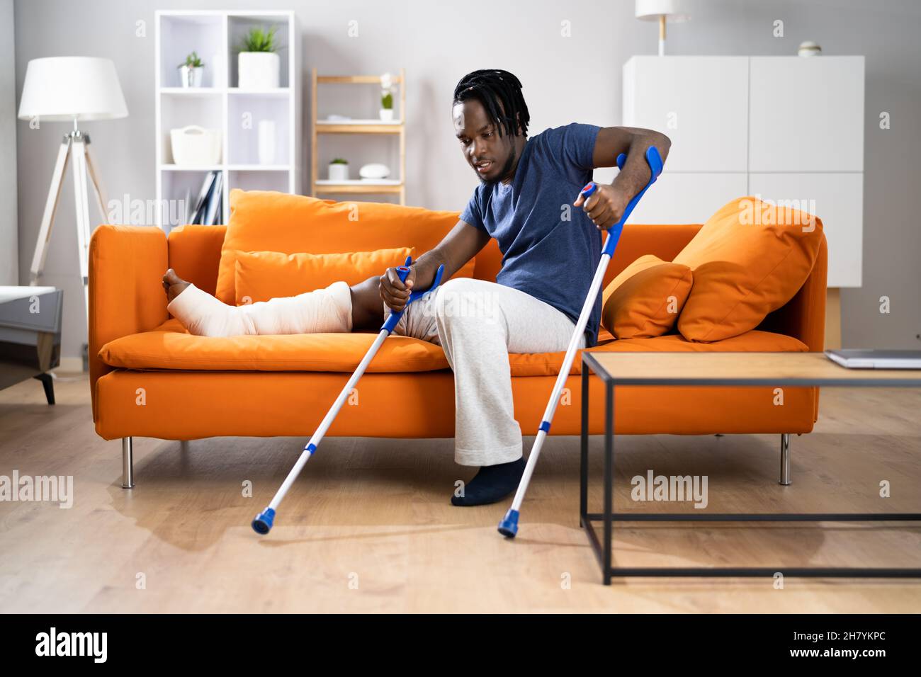 Man With Broken Leg After Accident Using Crutches Stock Photo Alamy man-with-broken-leg-after-accident-using-crutches-stock-photo-alamy