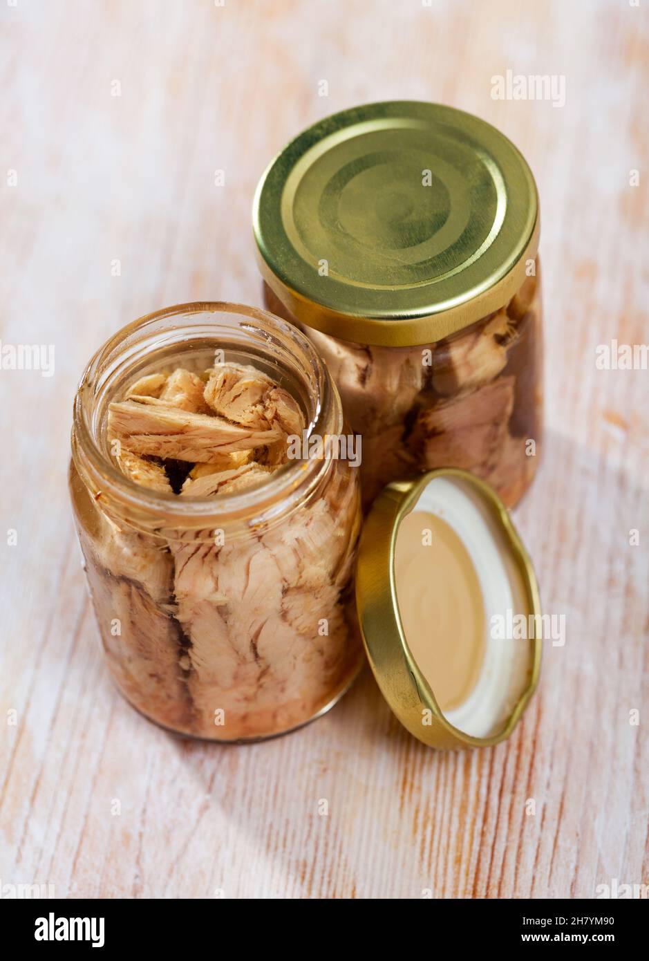 Glass jar with canned tuna in oil Stock Photo - Alamy