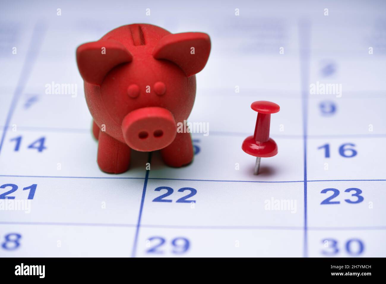 Money Investment Calendar And Piggy Bank. Finance Month Stock Photo - Alamy
