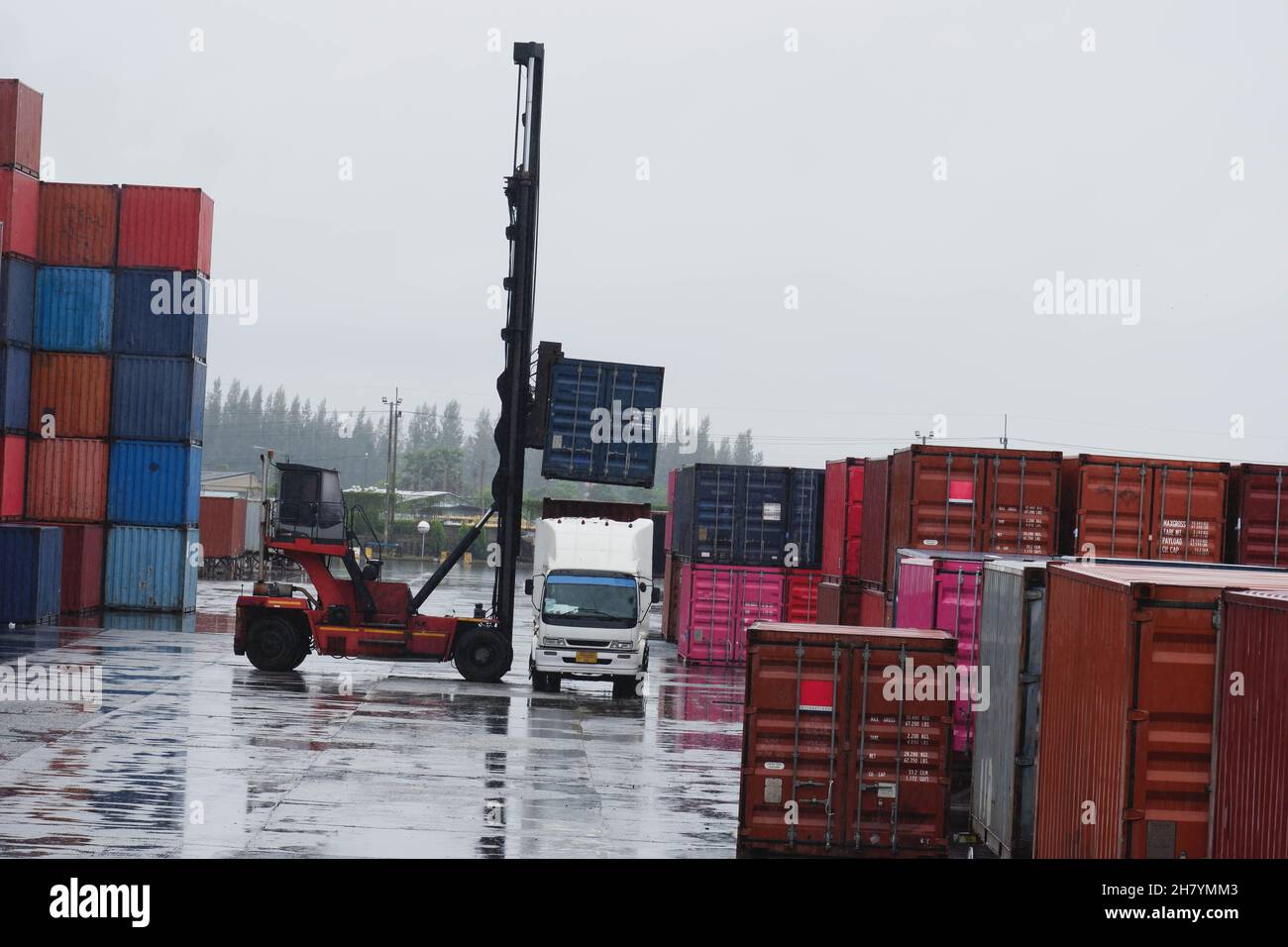 Huge warehouse truck crane containers hi-res stock photography and ...