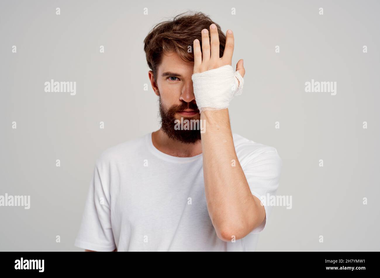 male patient bandaged hand injury to fingers hospitalization hospital ...