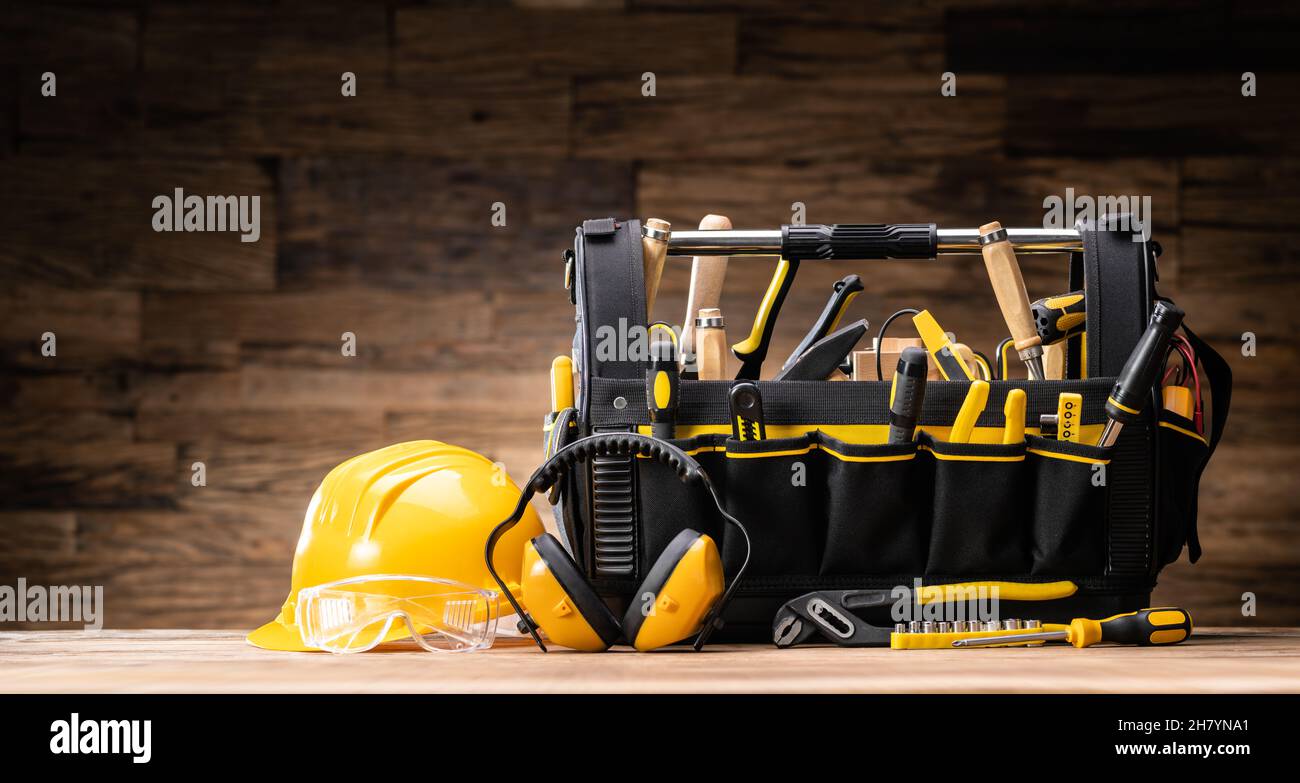 Various Manual Tools And Hardware In Toolbox On Wooded Background Stock ...