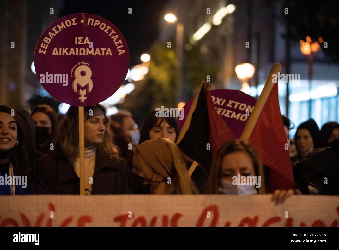 Athens, Greece. 25th Nov, 2021. Protesters hold banners and placards ...