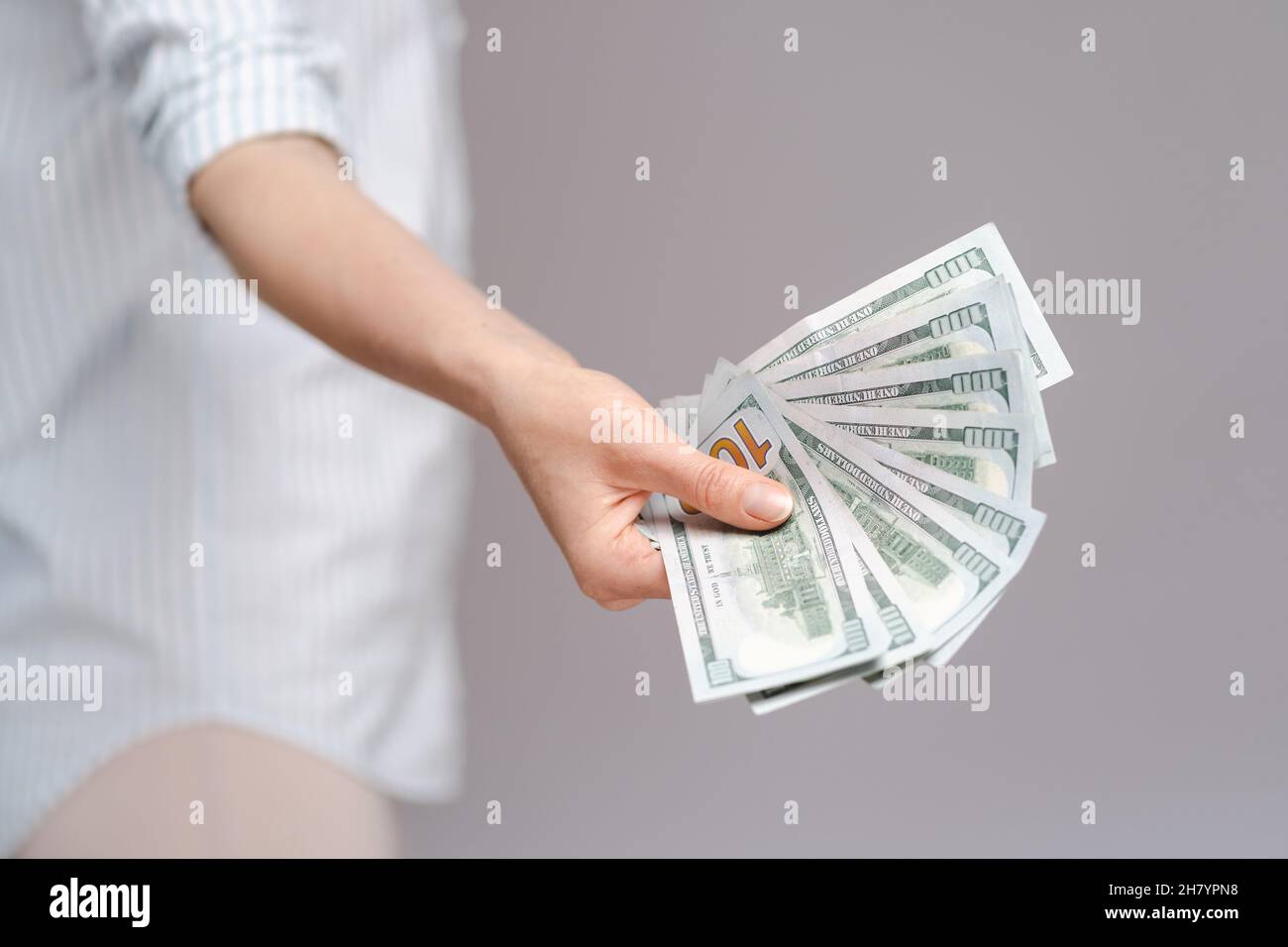 Lady holding cash hi-res stock photography and images - Alamy