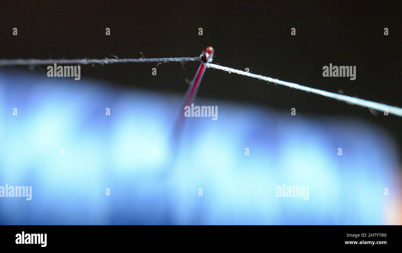 Woman needle threading studio hi-res stock photography and images - Alamy